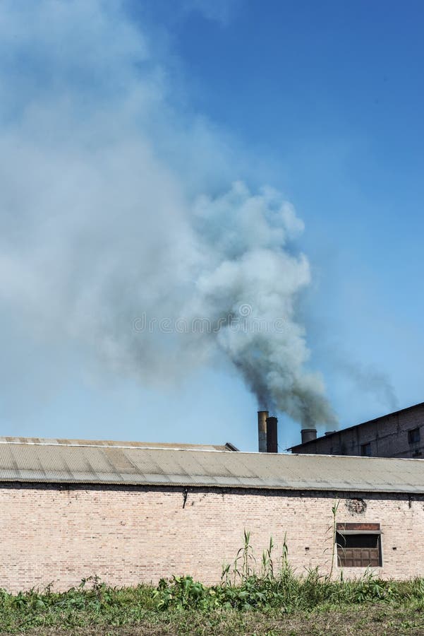Throwing smoke by chimneys stock image. Image of exhaust - 97975281