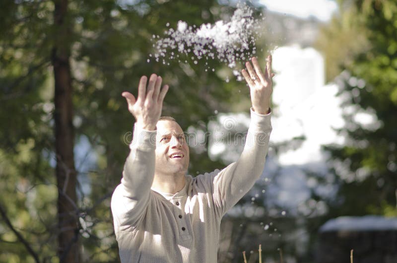 Throwing Snow Up in the Air. Stock Image - Image of adult, raised: 83307871