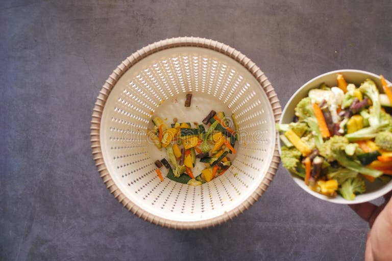 Throwing Vegetables in a Garbage Bin Stock Photo - Image of clean ...