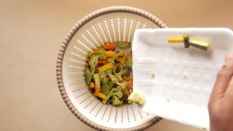 Throwing Vegetables in a Garbage Bin Stock Footage - Video of waste ...