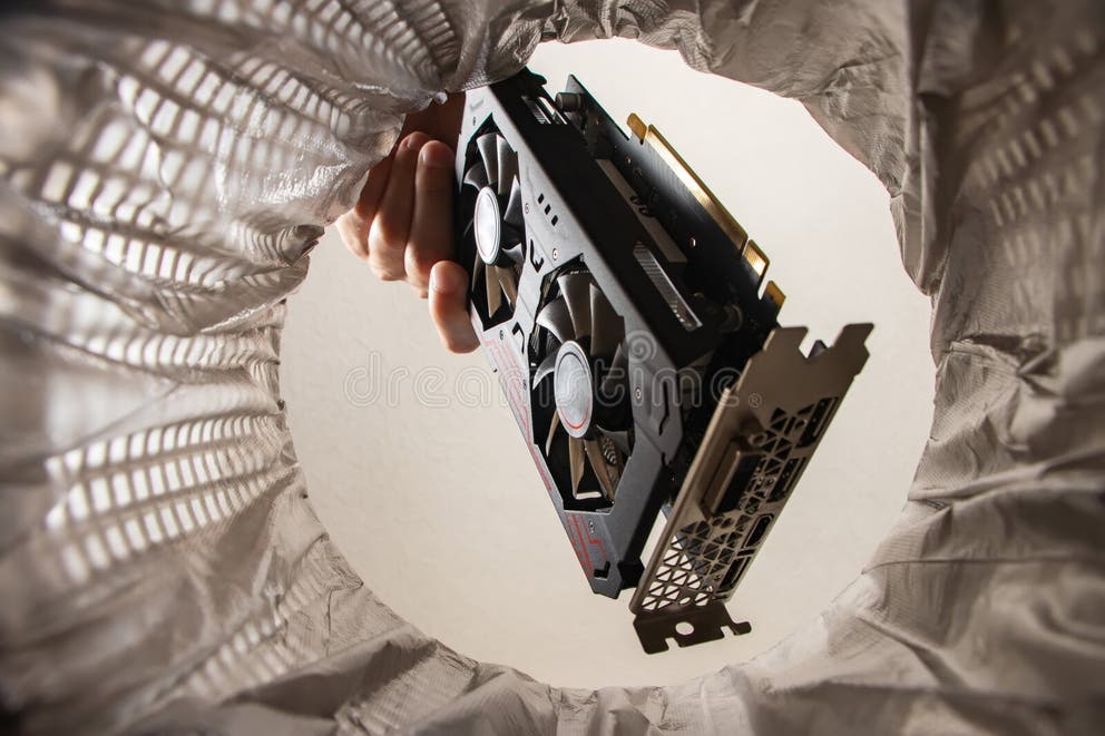 Throwing a Video Card in the Trash Bin, a Computer Video Card in Hand ...
