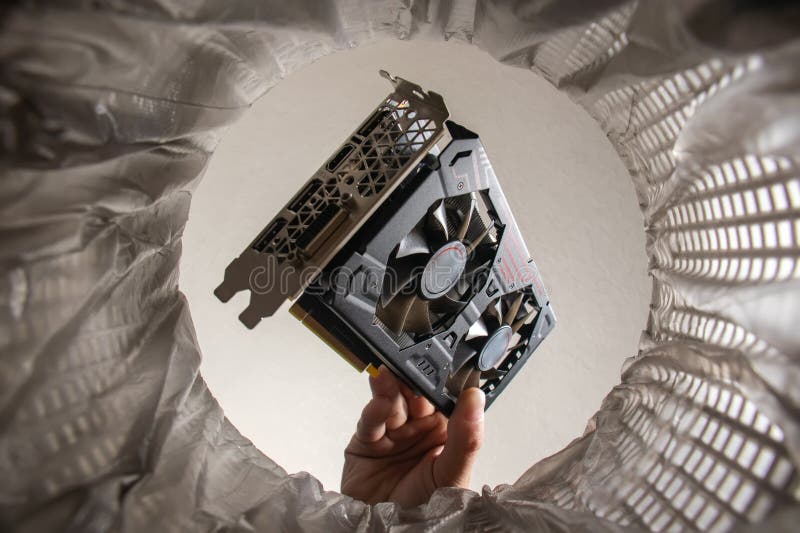 Throwing a Video Card in the Trash Bin, a Computer Video Card in Hand ...