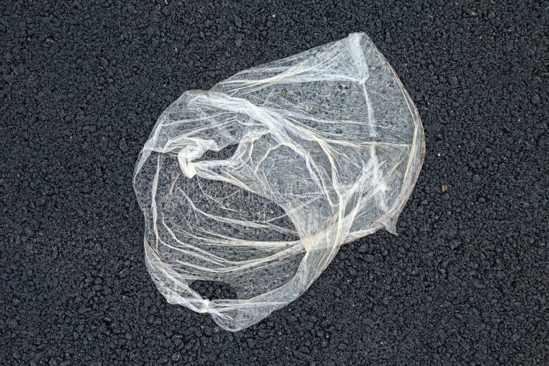 Thrown Away Single Use Plastic Bag on the Ground Illustration of ...