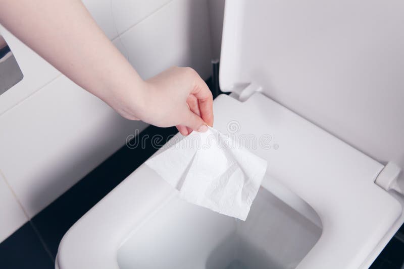 Throws a Napkin in the Toilet Stock Image - Image of napkin, throwing ...