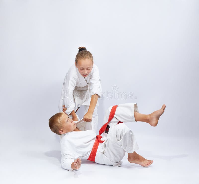 Young Children with a Smile in Kimono Sitting in a Ritual Pose Karate ...