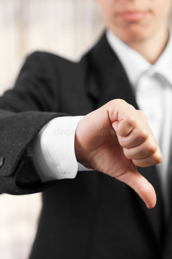 Thumb down failure gesture stock photo. Image of depression - 20469070