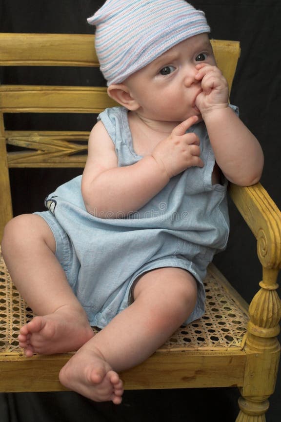 Thumb Sucker stock photo. Image of flawless, chair, skin - 1772490