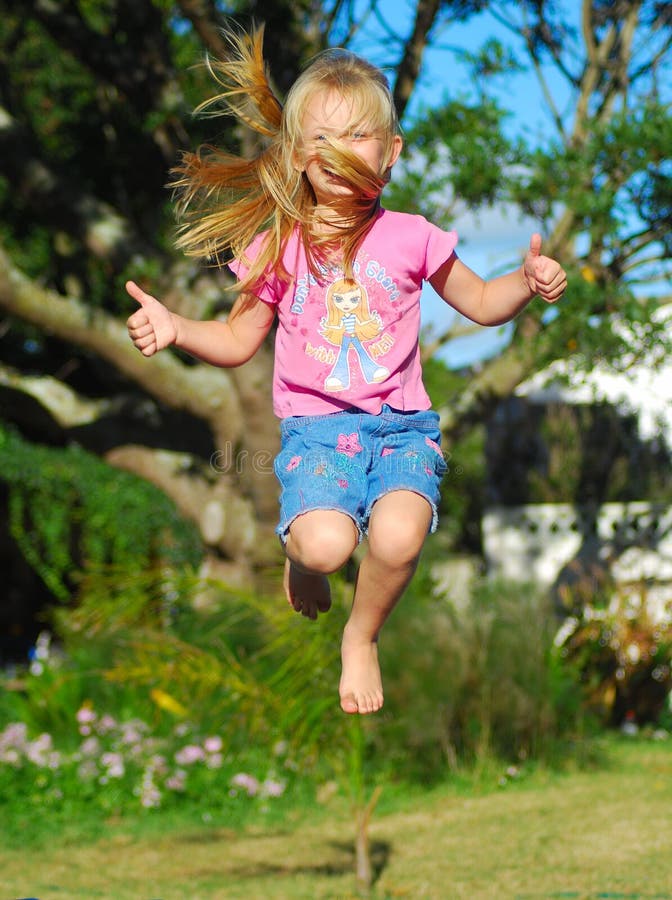 Happy jumping child stock photo. Image of face, children - 22126206