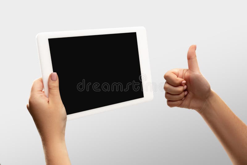 Close Up Female Hands Holding Tablet With Blank Screen During Online ... Close Up Female Hands Holding Tablet With Blank Screen During Online ...