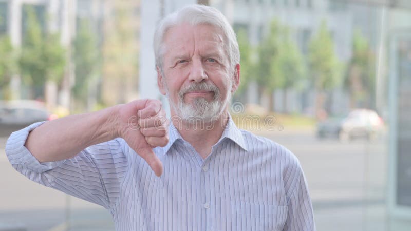 Thumbs Down by Old Man Standing Outdoor Stock Photo - Image of working ...