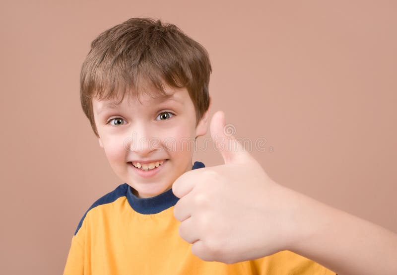 Young boy thumbs up stock photo. Image of child, think - 1878984