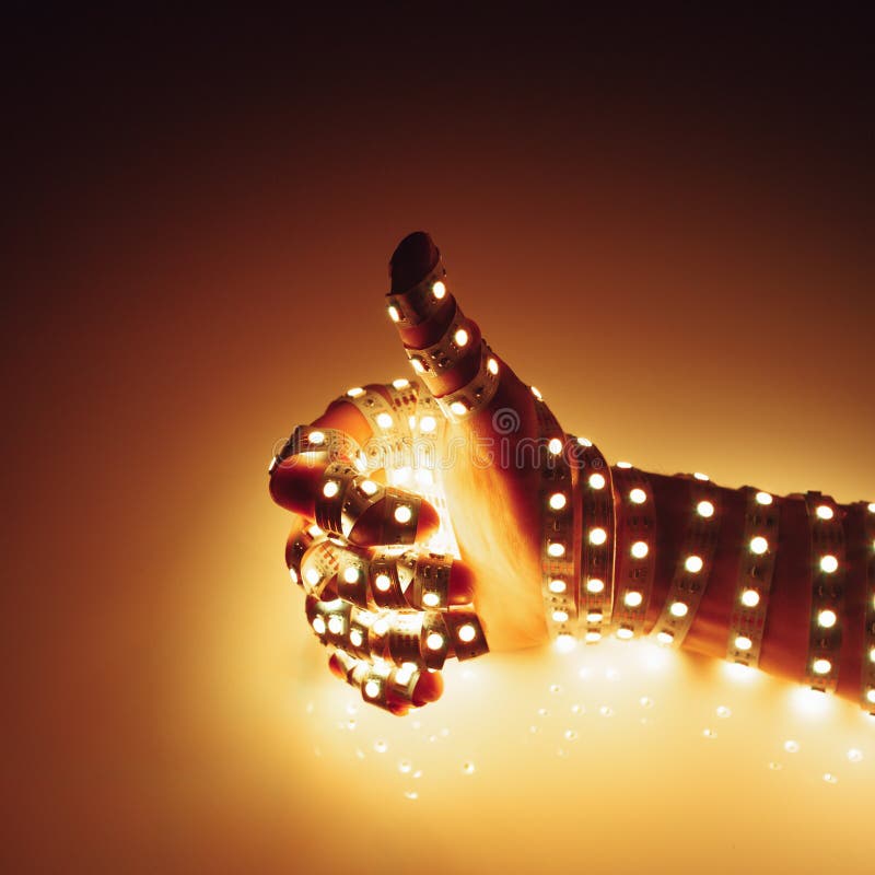 Thumbs Up Hand Covered with Warm Yellow Led Lights, Illuminated ...