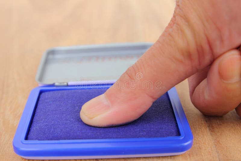 Thump on ink pad stock image. Image of authority, notepad - 76051895