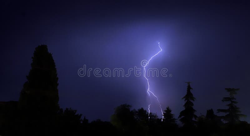 Thunder in the Night with Blue Color and Trees Stock Image - Image of ...