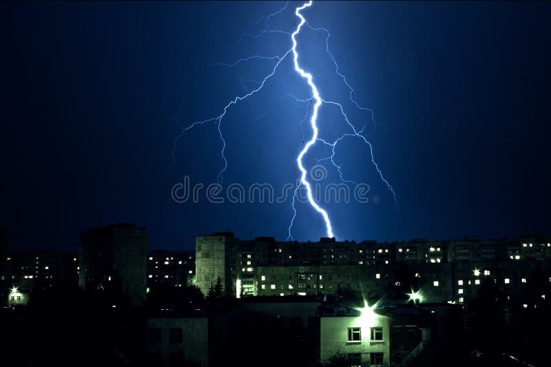 Thunderbolt and Lightning.night Thunderstorm Over the Buildings in the ...