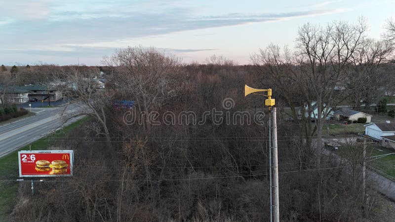 Thunderbolt Tornado Siren in Front of Trees and Road Stock Image ...