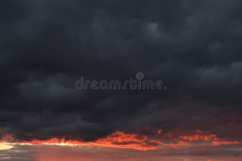 Thunderclouds with Breaking Rays Sun at Sunset Stock Image - Image of ...