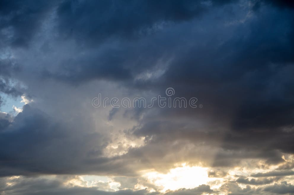 Thunderclouds in the Sky at Sunset. Stock Photo - Image of light ...