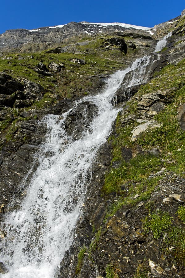 Thundering Waterfall stock photo. Image of waters, valais - 163299532