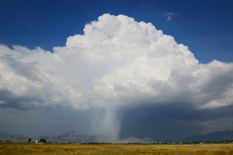 Thunderstorm Cloud with Falling Rain Stock Photo - Image of pelagonia ...