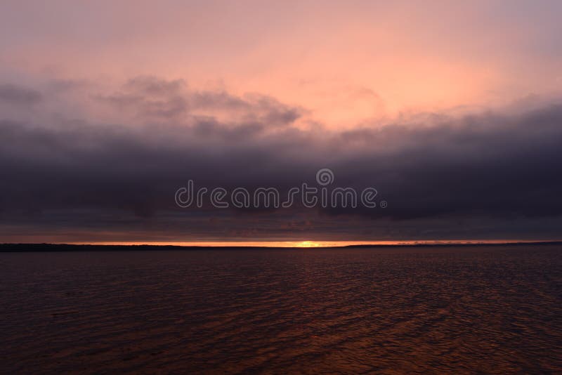 Thunderstorm Cloud in Sunlight on Sunset in the Bright Ominous Sky on ...