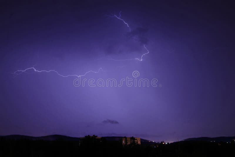 Thunderstorm Lightning in the Blue Purple Evening Sky Stock Photo ...