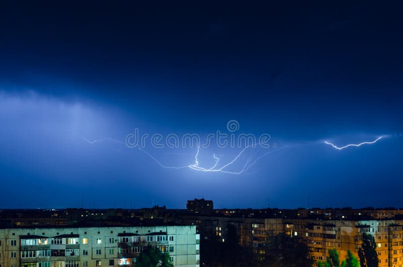 Thunderstorm with Lightning and Thunder Over the Night City Stock Image ...
