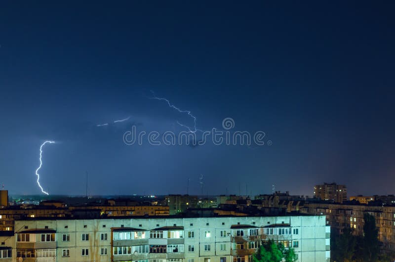 Thunderstorm with Lightning and Thunder Over the Night City Stock Image ...