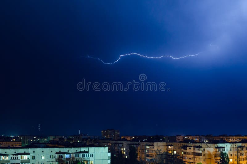 Thunderstorm with Lightning and Thunder Over the Night City Stock Image ...