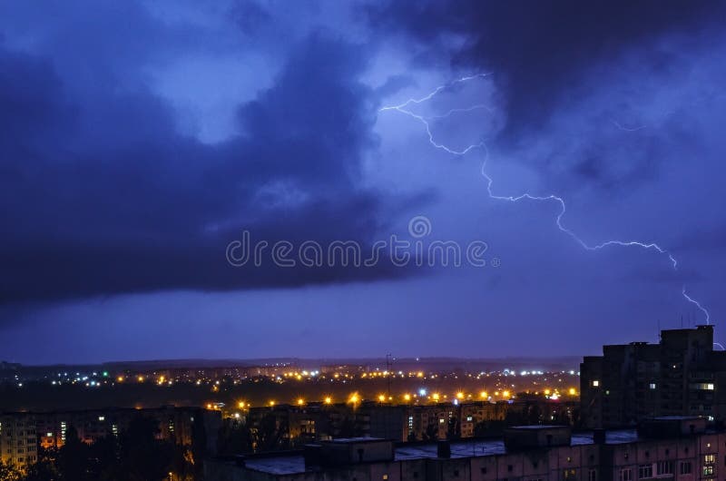 Thunderstorm with Lightning and Thunder Over the Night City Stock Photo ...