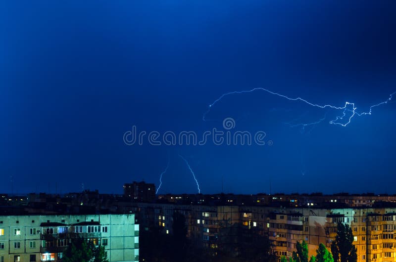 Thunderstorm with Lightning and Thunder Over the Night City Stock Image ...