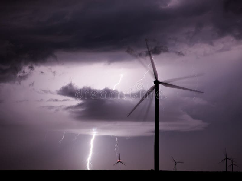 Thunderstorm Over a Wind Farm Representing Renewable Energy Stock Photo ...