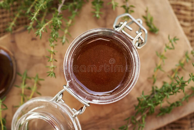 Thyme Syrup in a Glass Jar, Top View Stock Photo - Image of green ...