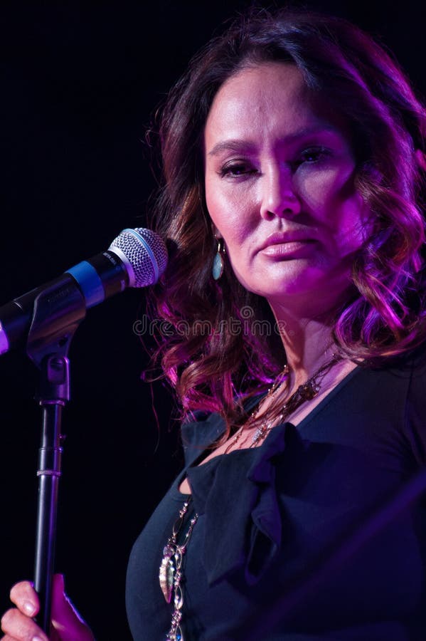 Tia Carrere & Daniel Ho Editorial Photo - Image of guitar, concert ...