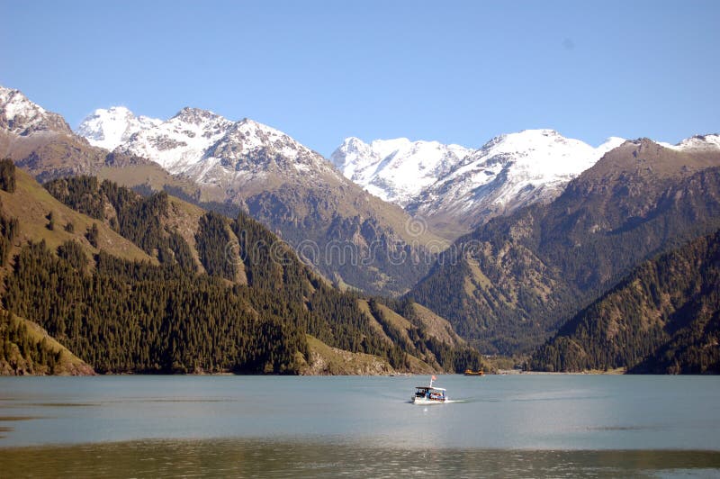 Tianshan and Tianchi stock image. Image of lake, moutains - 20693991