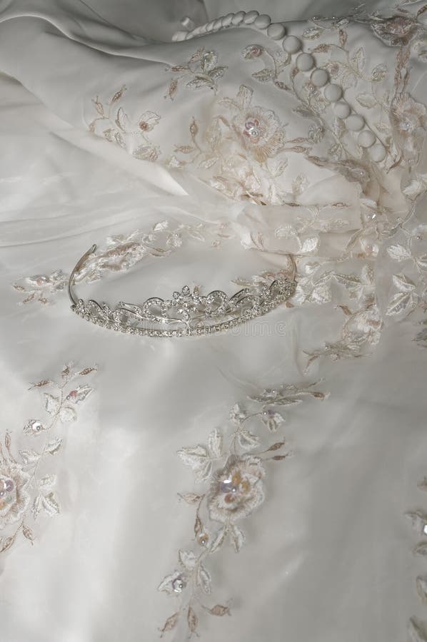 Tiara over wedding dress stock image. Image of buttons - 4803605