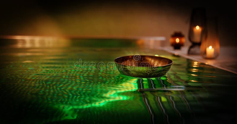 Tibetan Bowl on the Surface of the Pool. Water Relaxation and Deep ...