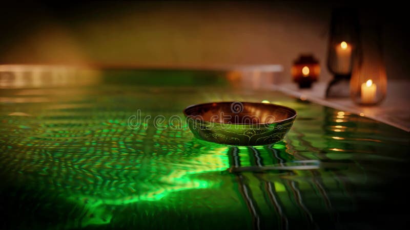 Tibetan Bowl on the Surface of the Pool. Water Relaxation and Deep ...