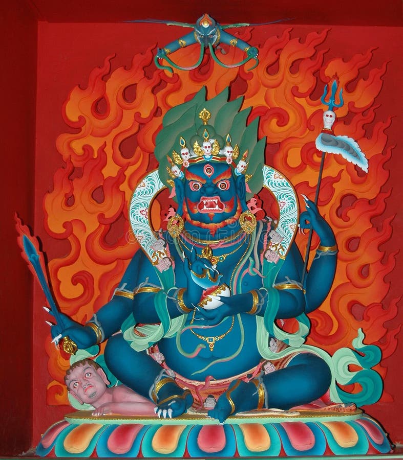Tibetan Deity of Blue with Four Arms in a Monastery Stock Image - Image ...