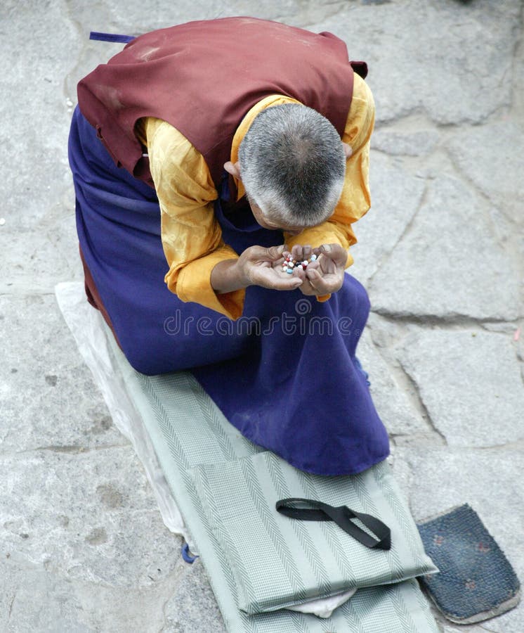 Tibetan pilgrim in Lhasa stock photo. Image of pray, tibetan - 3193148