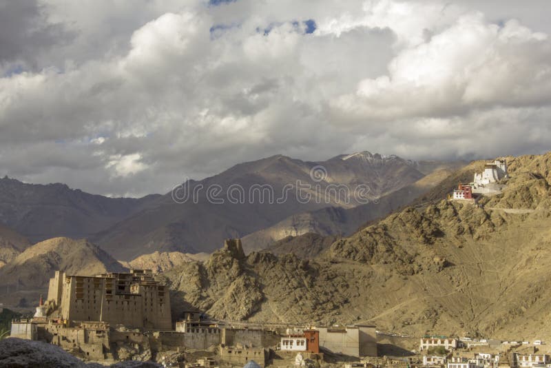 Tibetan Temple and Castle on the Mountain Under Heavy Sky Stock Photo ...
