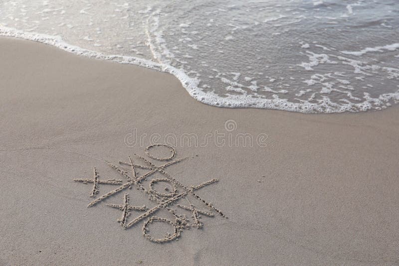 Tic Tac Toe Game Drawn on Sand Near Sea, Space for Text Stock Image ...