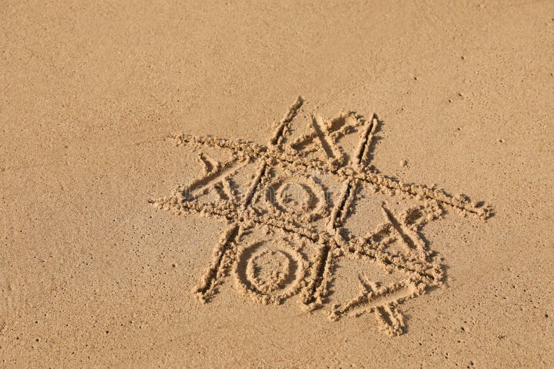 Tic Tac Toe Game Drawn on Sandy Beach Stock Photo - Image of seashore ...