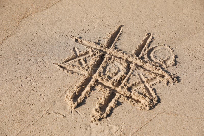 Tic Tac Toe Game Drawn on Sandy Beach, Above View Stock Photo - Image ...