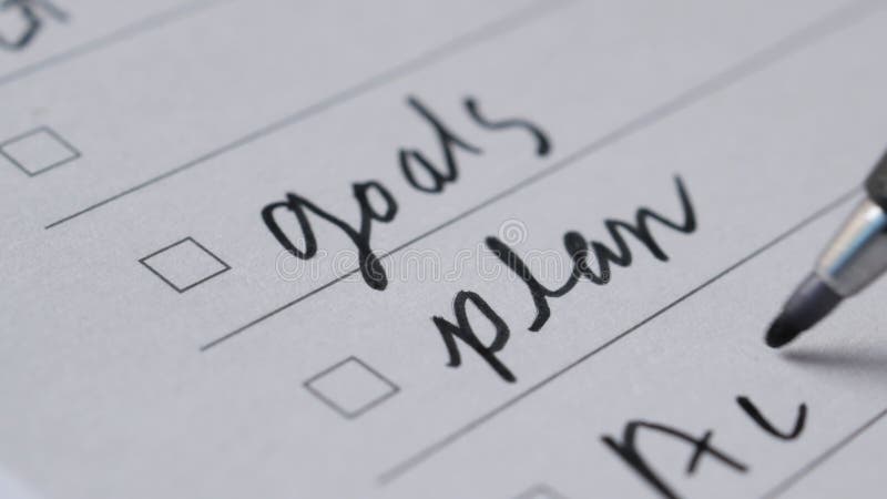 Tick Mark on Planning Goals on Notepad Stock Footage - Video of ...