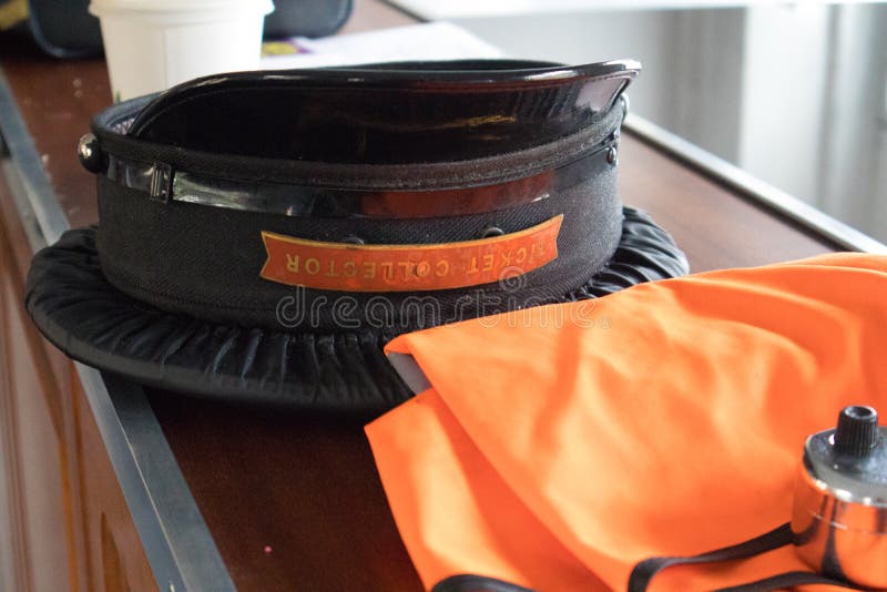 Ticket Collector Hat and High Vis Jacket Stock Image - Image of ticket ...