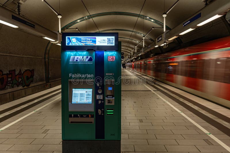 Ticket Machine at the Empty Subway Station with the Train Driving by ...