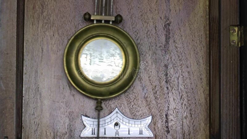 The Ticking Pendulum of a Very Old Wall Clock Stock Footage - Video of ...