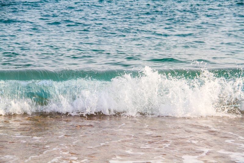 Tidal Bore. Blue Waves with Bats Rolling Onto a Sandy Beach Stock Image ...