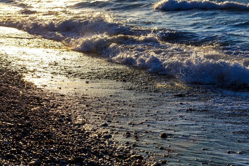 Tidal Bore. the Wave Rolls Onto the Seashore, Which is Covered with ...